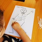 Easy Halloween DIY earbud skeleton | ActivityBox